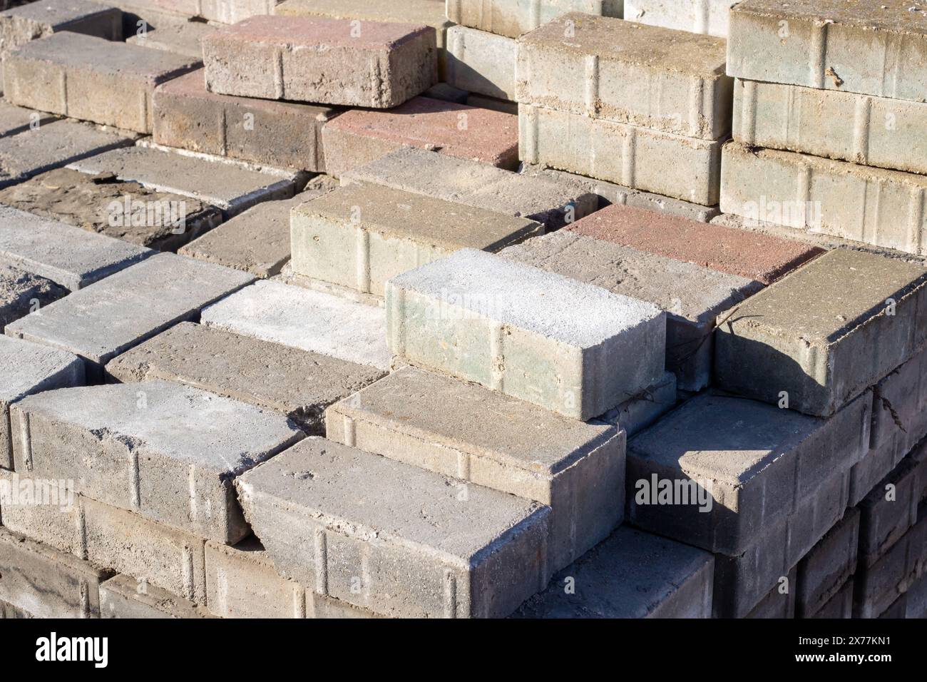 A stack of bricks placed one on top of the other, used in construction ...