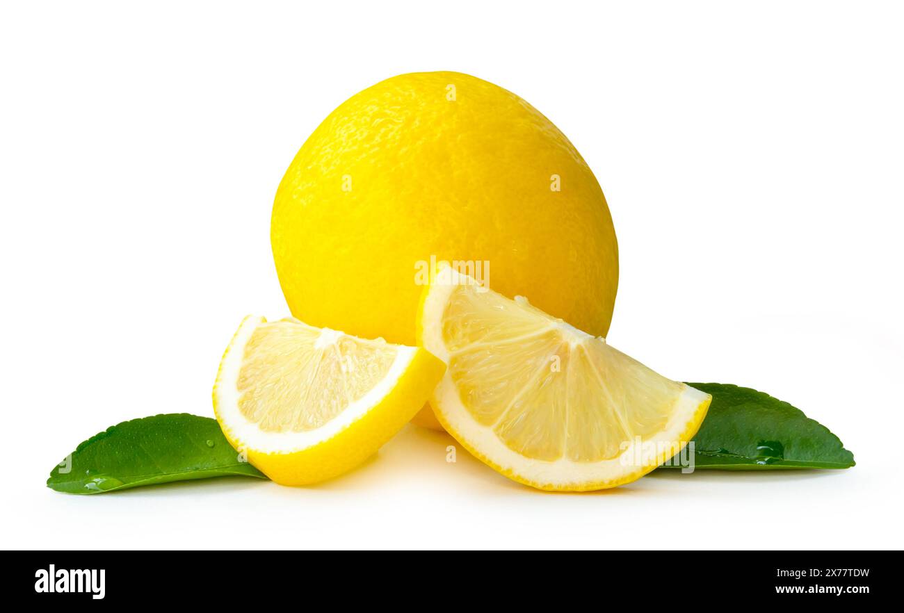 Front view of yellow lemon with slices or quarters and green leaves in ...