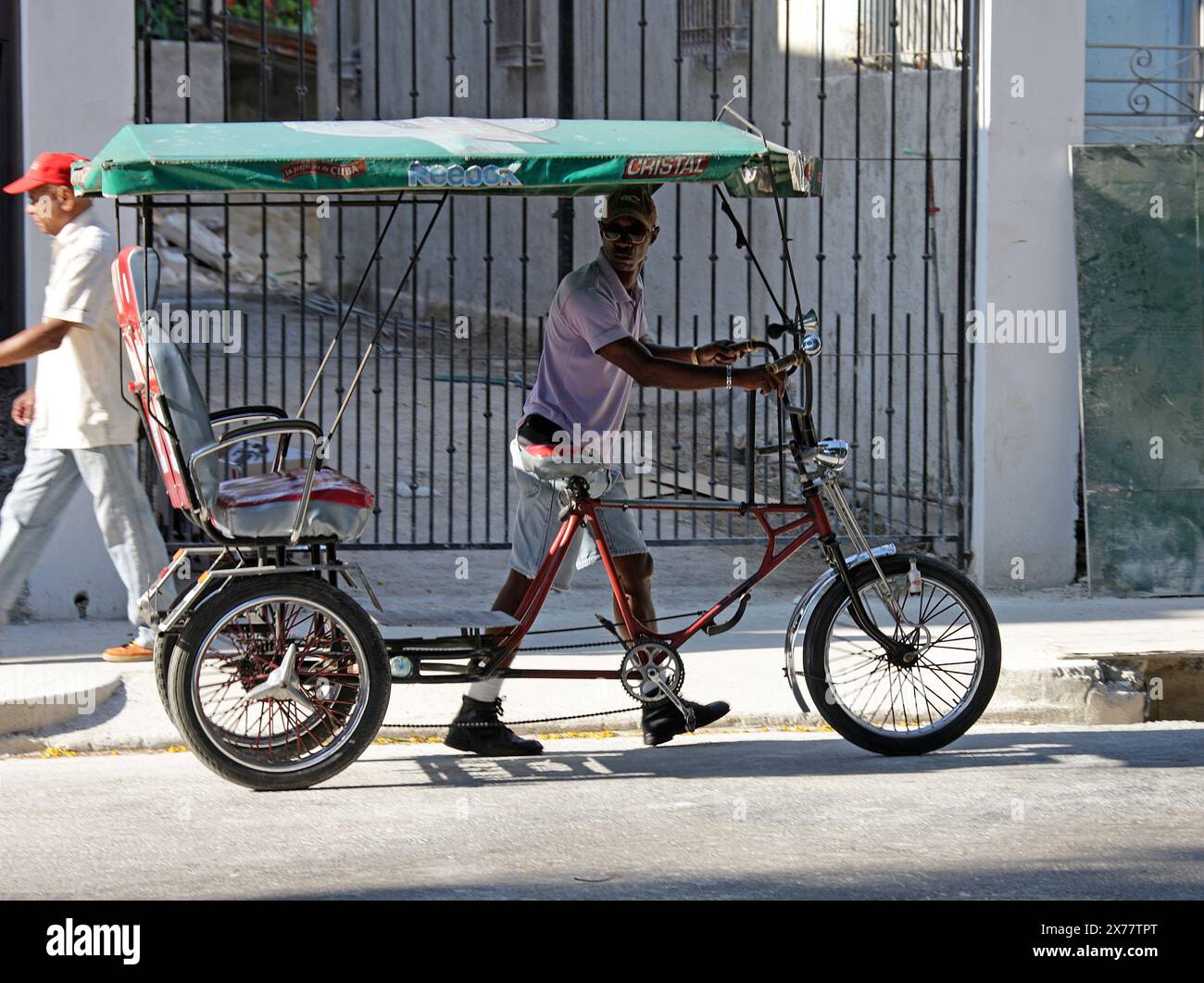 Pedal powered tricycle taxi hi-res stock photography and images - Alamy