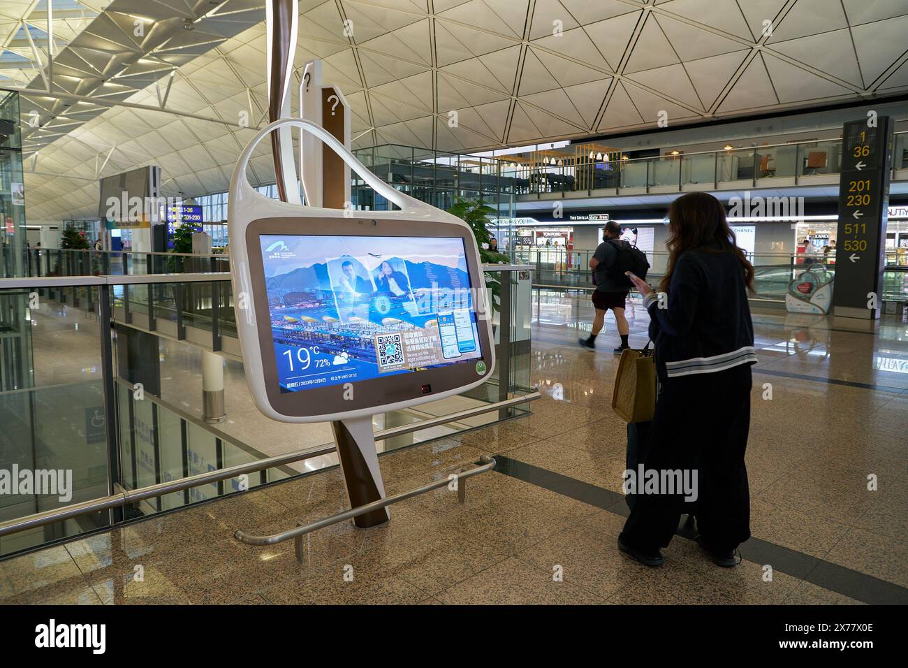 HONG KONG, CHINA - DECEMBER 08, 2023: an interactive self-service information kiosk in Hong Kong ...