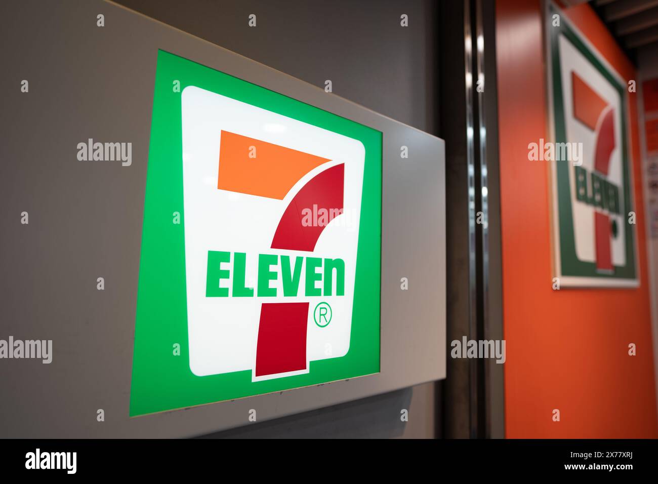 HONG KONG, CHINA - DECEMBER 04, 2023: close up shot of 7-Eleven sign as ...