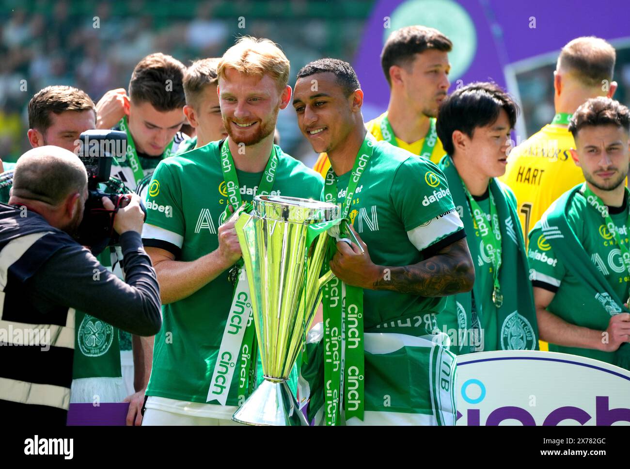 Celtic's Liam Scales (left) and Adam Idah celebrate with the cinch ...