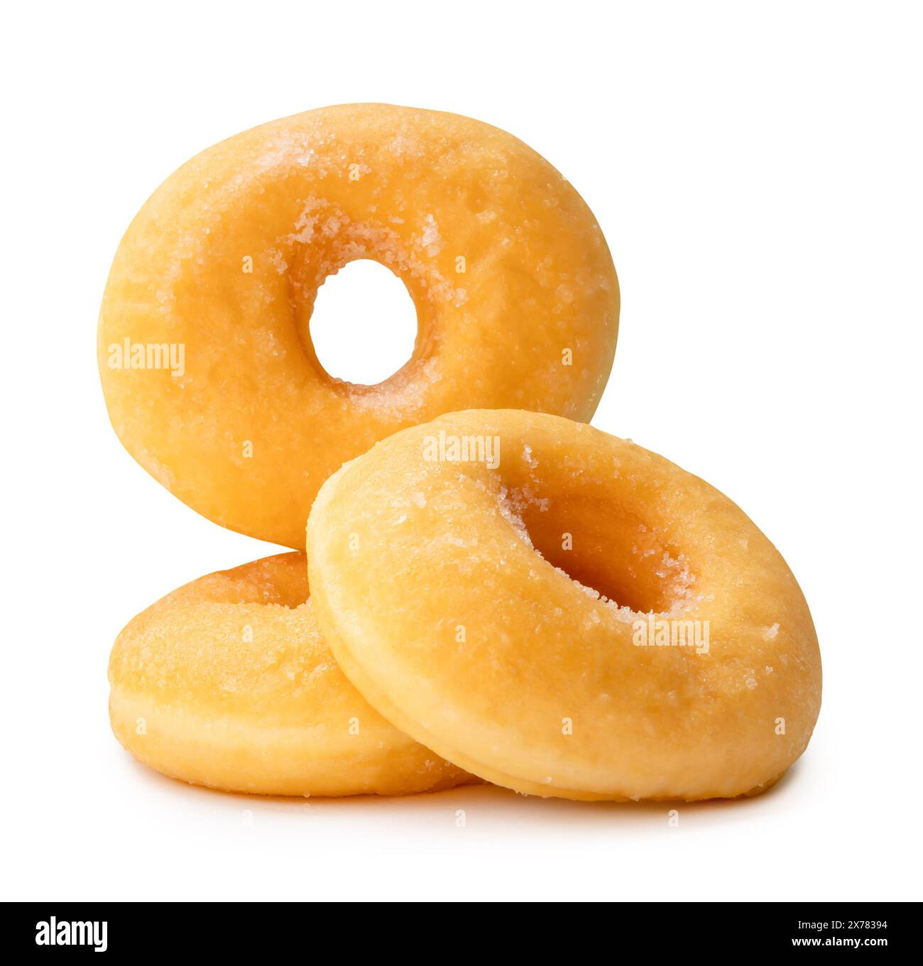 Front view of sugar glazed cinnamon donuts in stack is isolated on ...