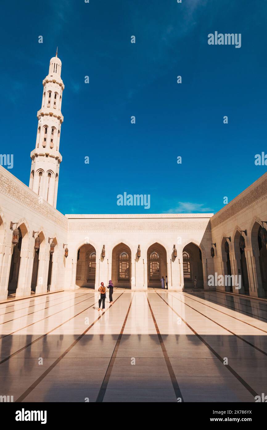 Low-angle view of the Sultan Qaboos Grand Mosque courtyard in Muscat ...