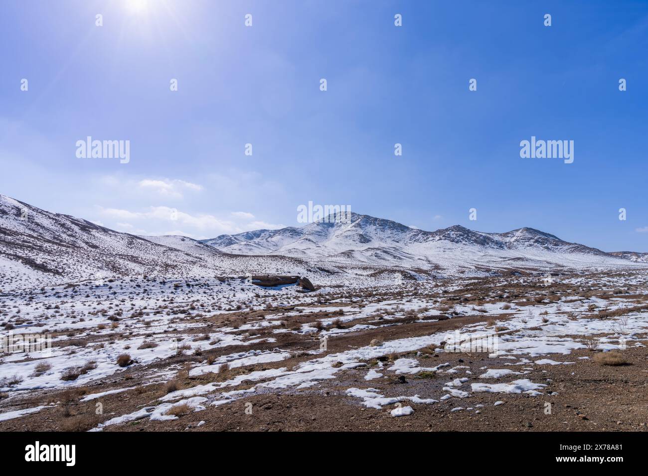 The journey from Isfahan to Tehran in March offers views of snow-capped ...