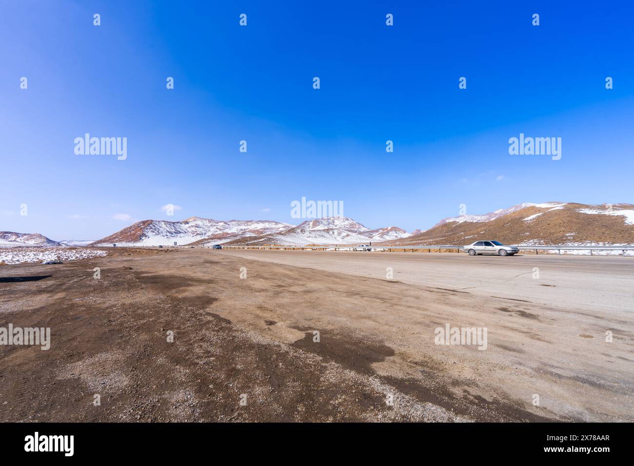 The journey from Isfahan to Tehran in March offers views of snow-capped ...