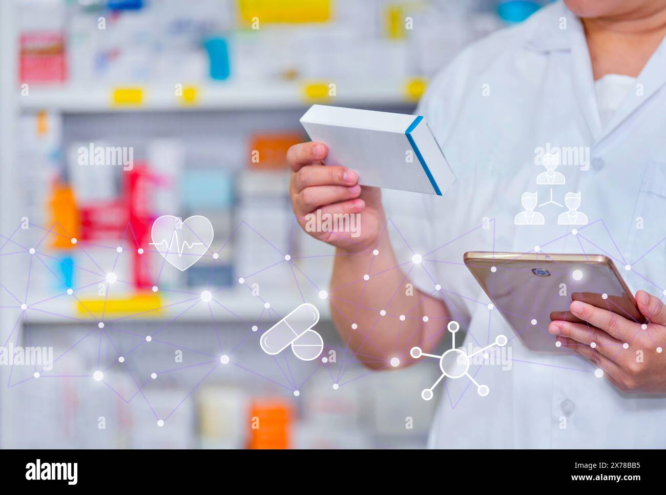 Pharmacist holding computer tablet using for filling prescription in ...