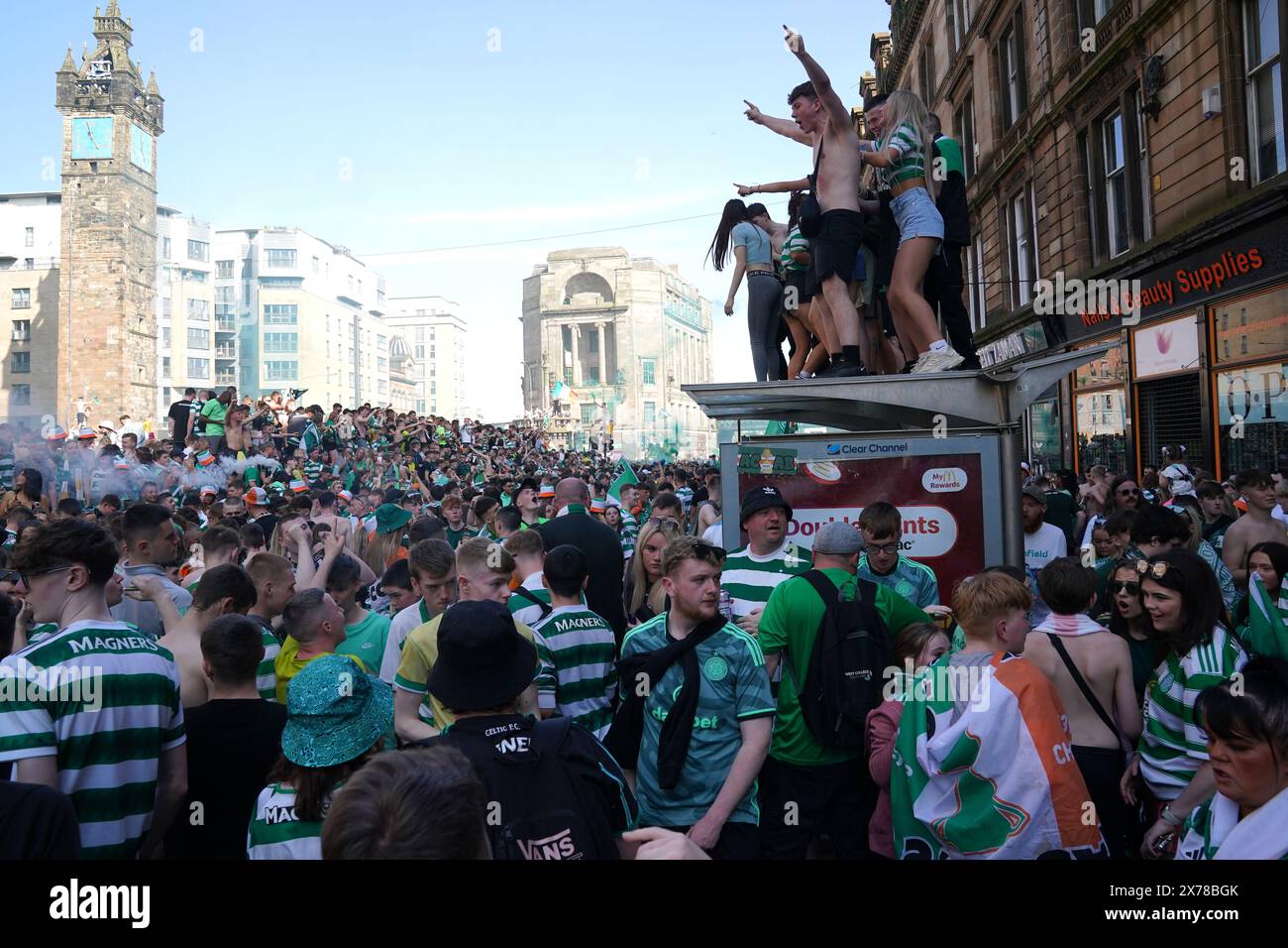 Celtic fans celebrate after winning the cinch Premiership in the city ...