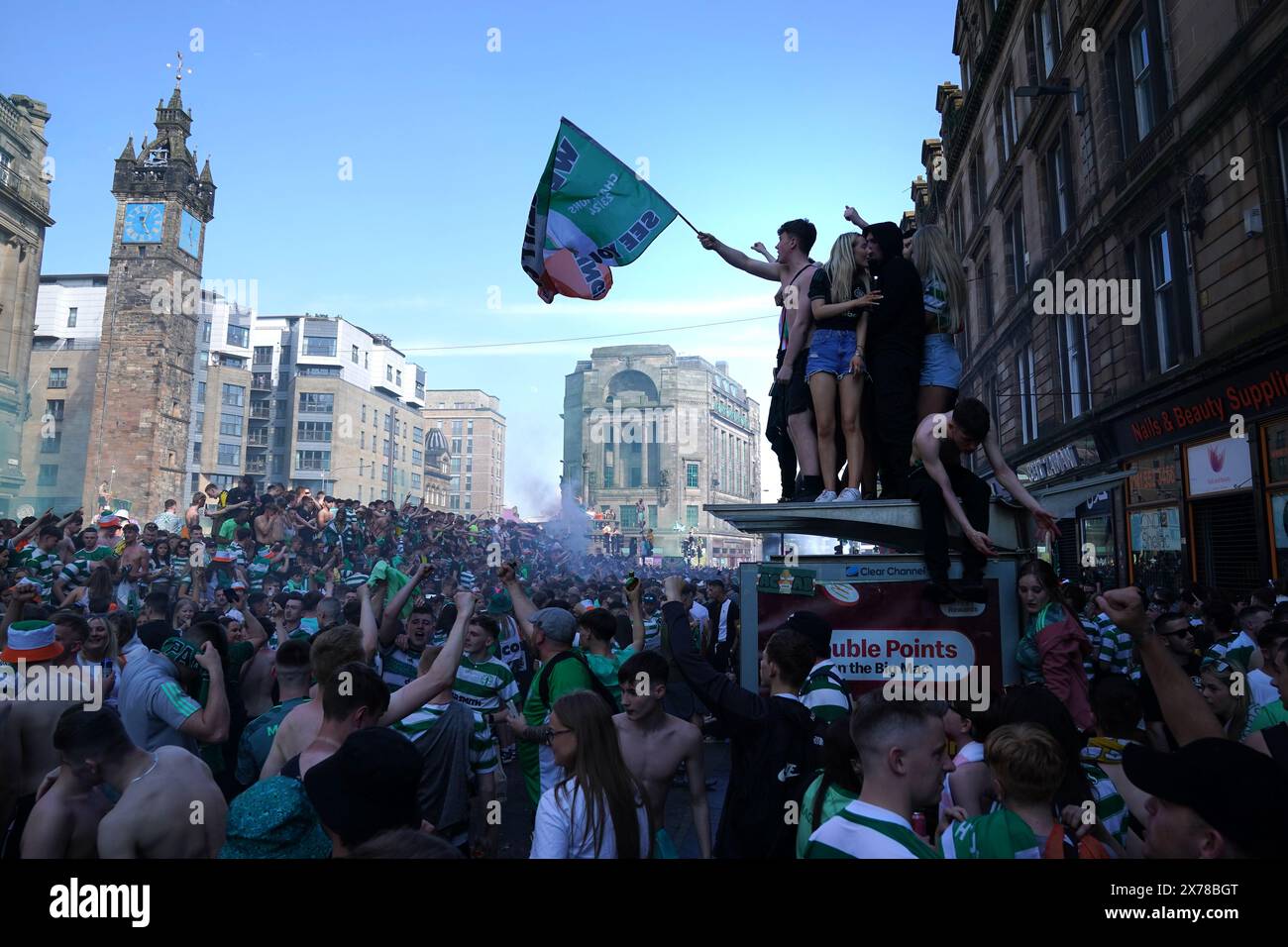 Celtic fans celebrate after winning the cinch Premiership in the city ...