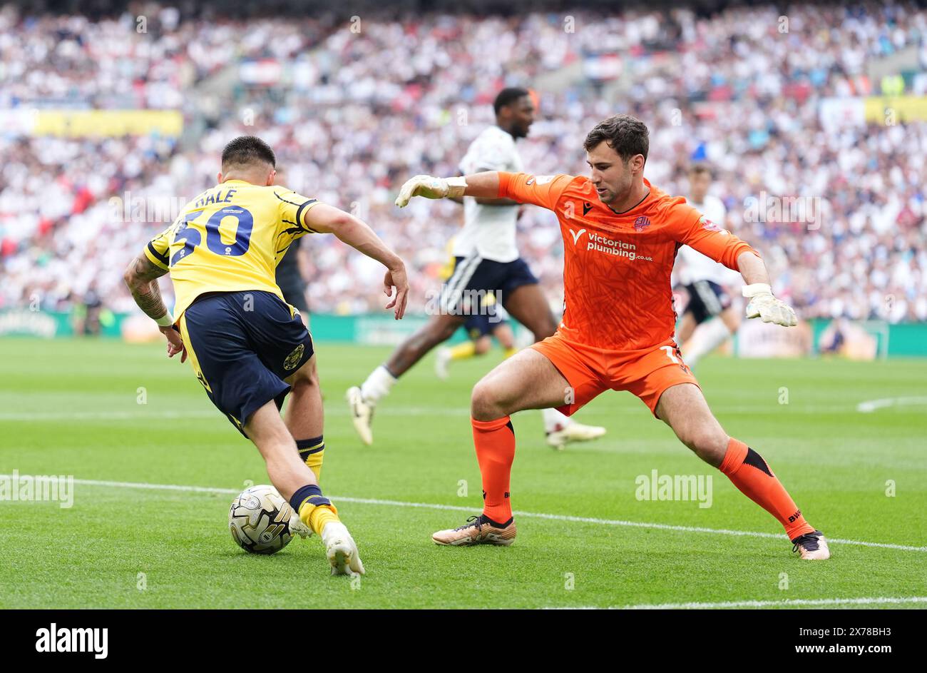 Oxford United's Owen Dale attempts to take the ball past Bolton ...