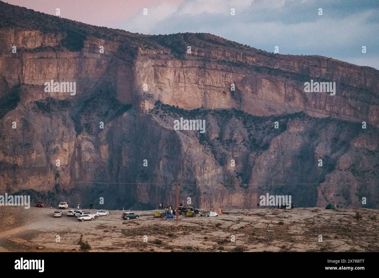 Tourist vehicles gather on the edge of a cliff at the "Grand Canyon of ...