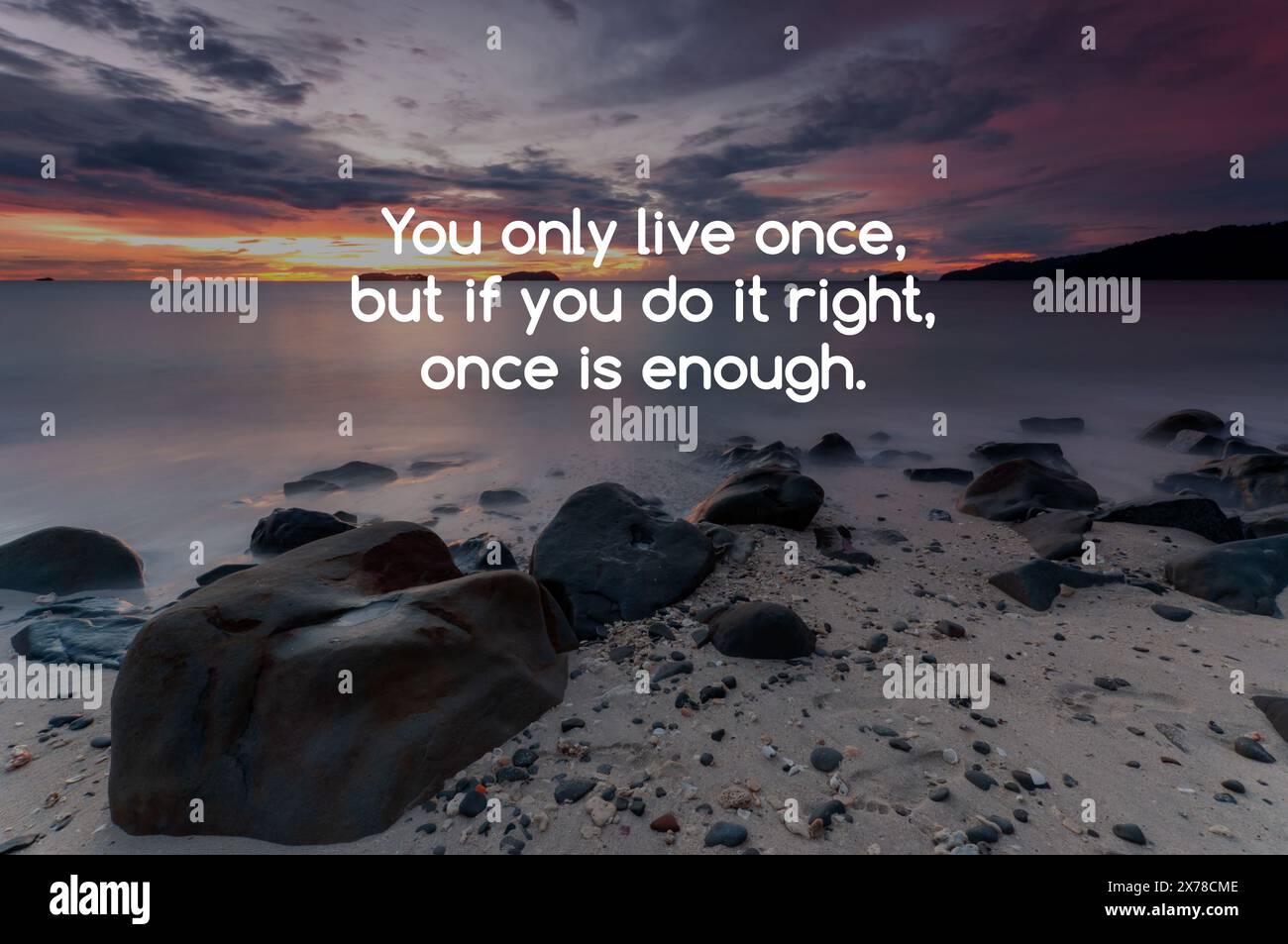 Sunset background with inspirational quotes text you only live once but ...