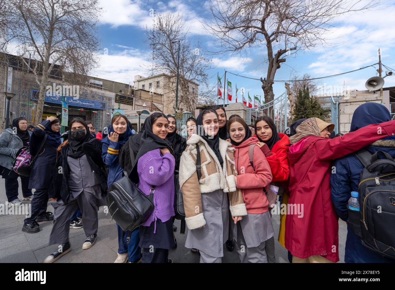 Tehran, Iran - March 7, 2024: A group of local female students leave ...