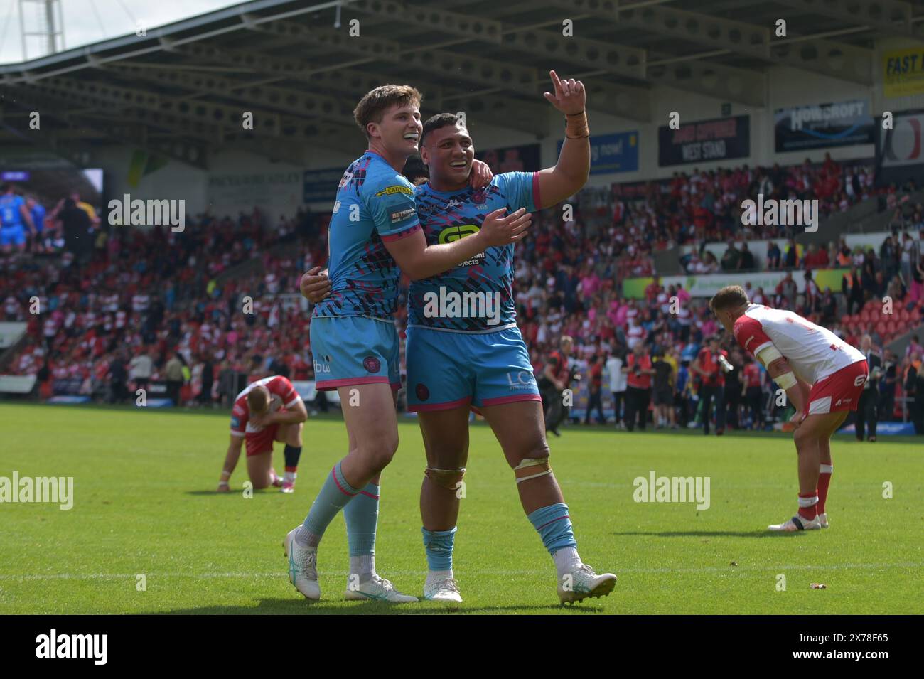 Patrick Mago of Wigan Warriors and Ethan Havard of Wigan Warriors ...