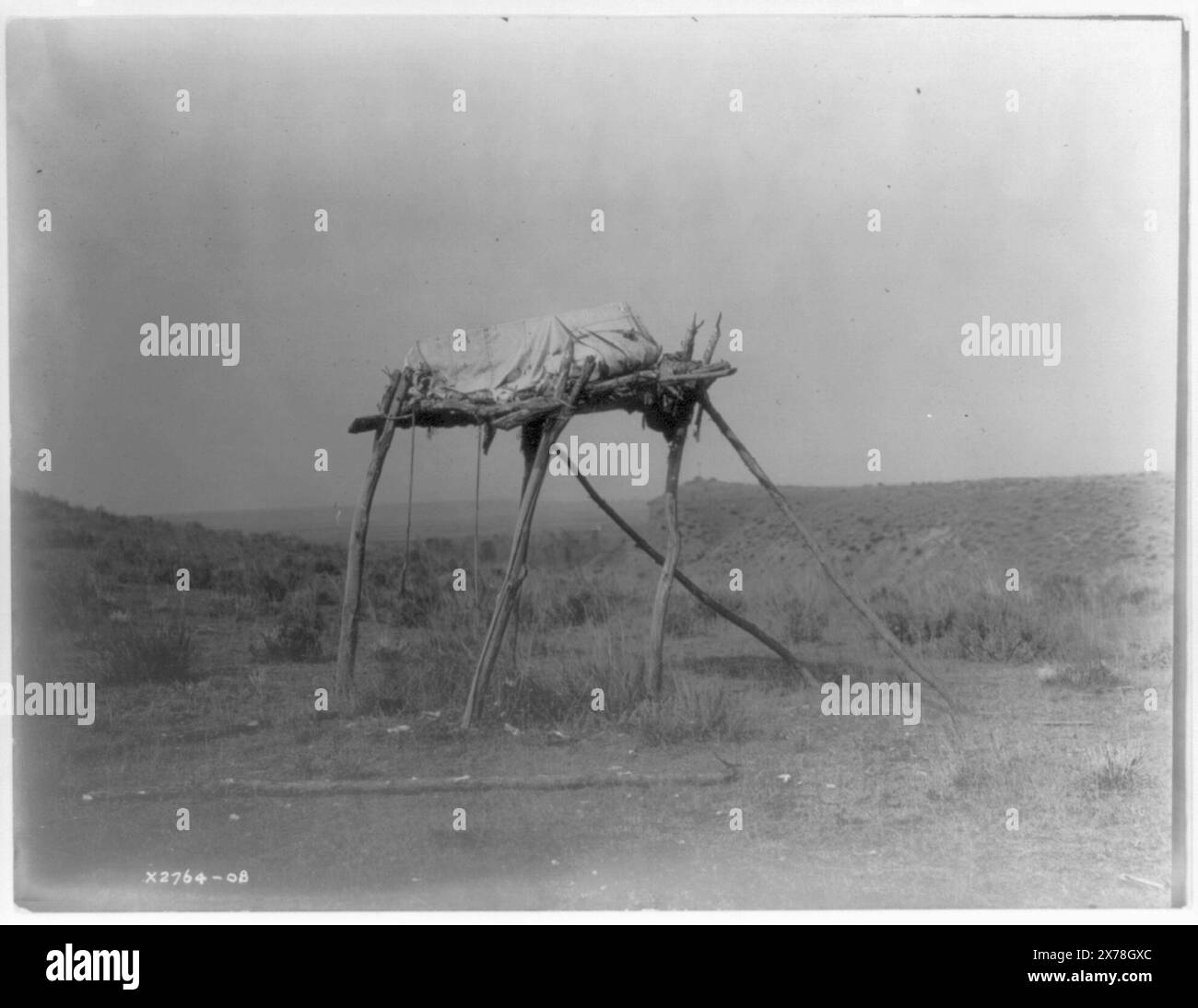 A burial platform Apsaroke, Curtis no. 2764-08., On verso: The grave of ...