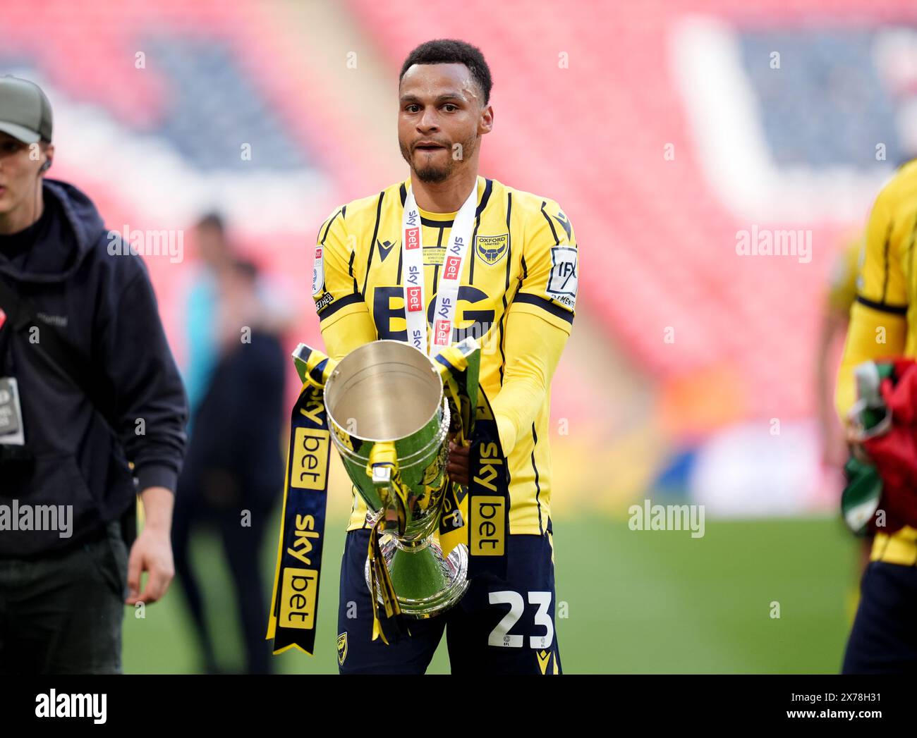 Oxford United's Josh Murphy with the trophy after the Sky Bet League ...