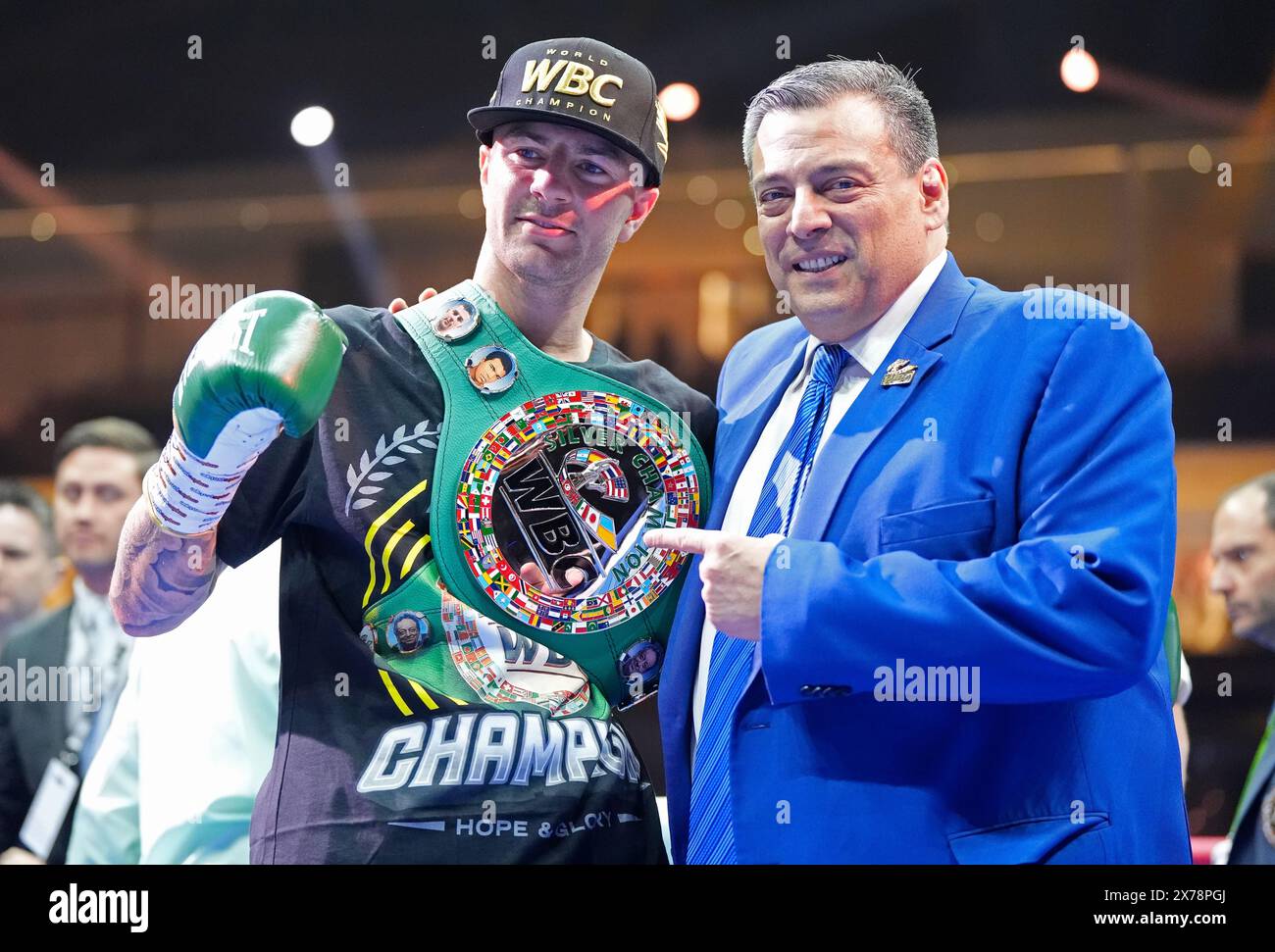 Mark Chamberlain (left) celebrates with WBC President Mauricio Sulaiman ...
