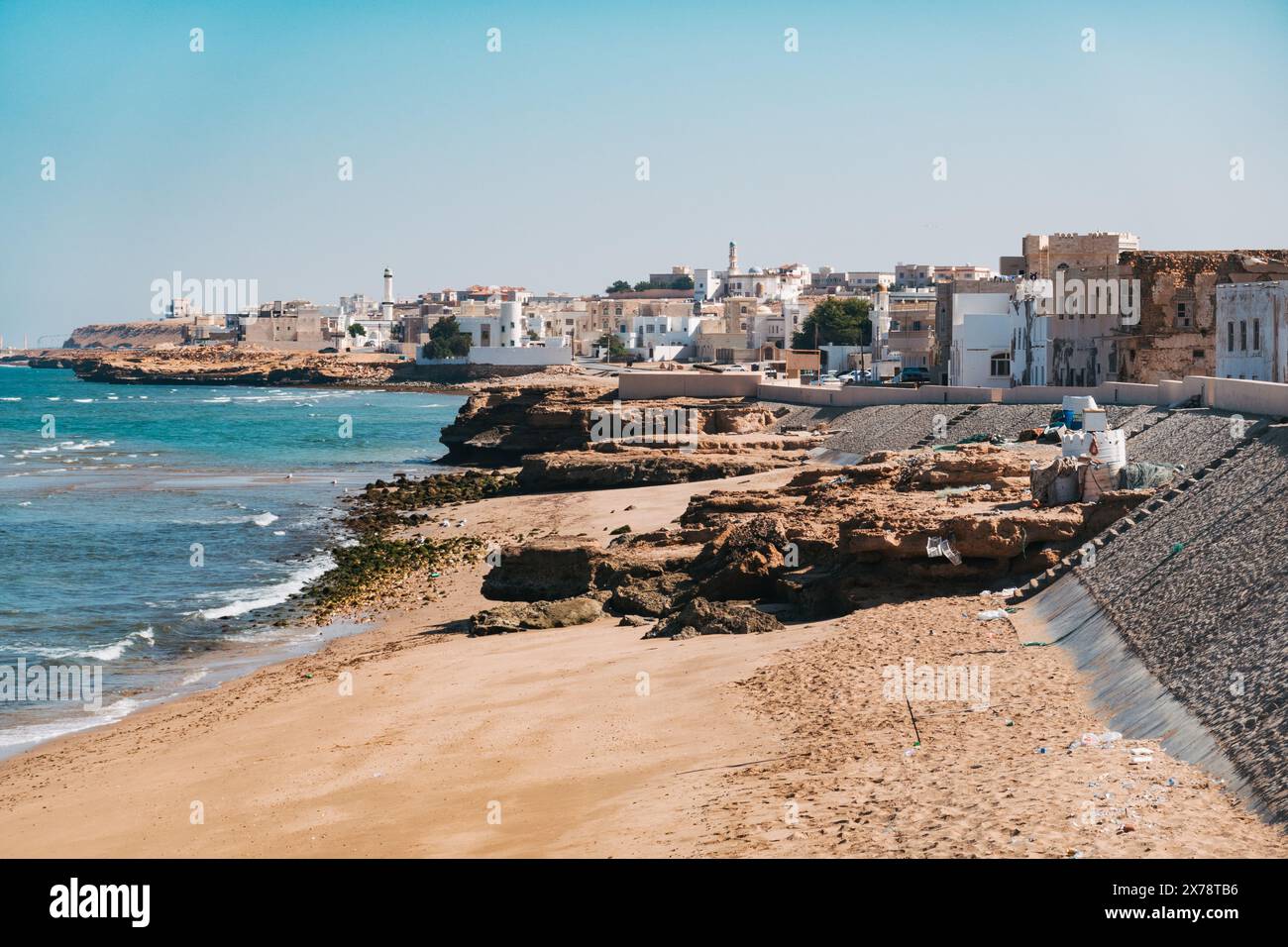 Coastal view of Sur, Oman, with sandy beaches, rocky shoreline, white ...