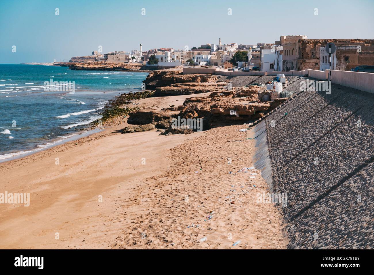Coastal view of Sur, Oman, with sandy beaches, rocky shoreline, white ...