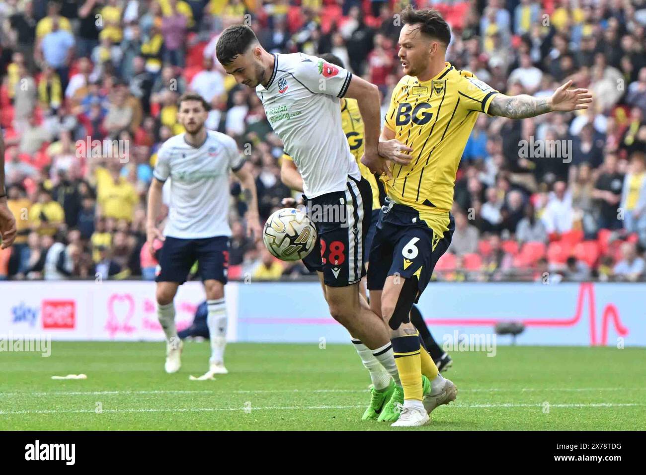 Aaron Collins (28 Bolton Wanderers) challenged by Josh McEachran (6 ...