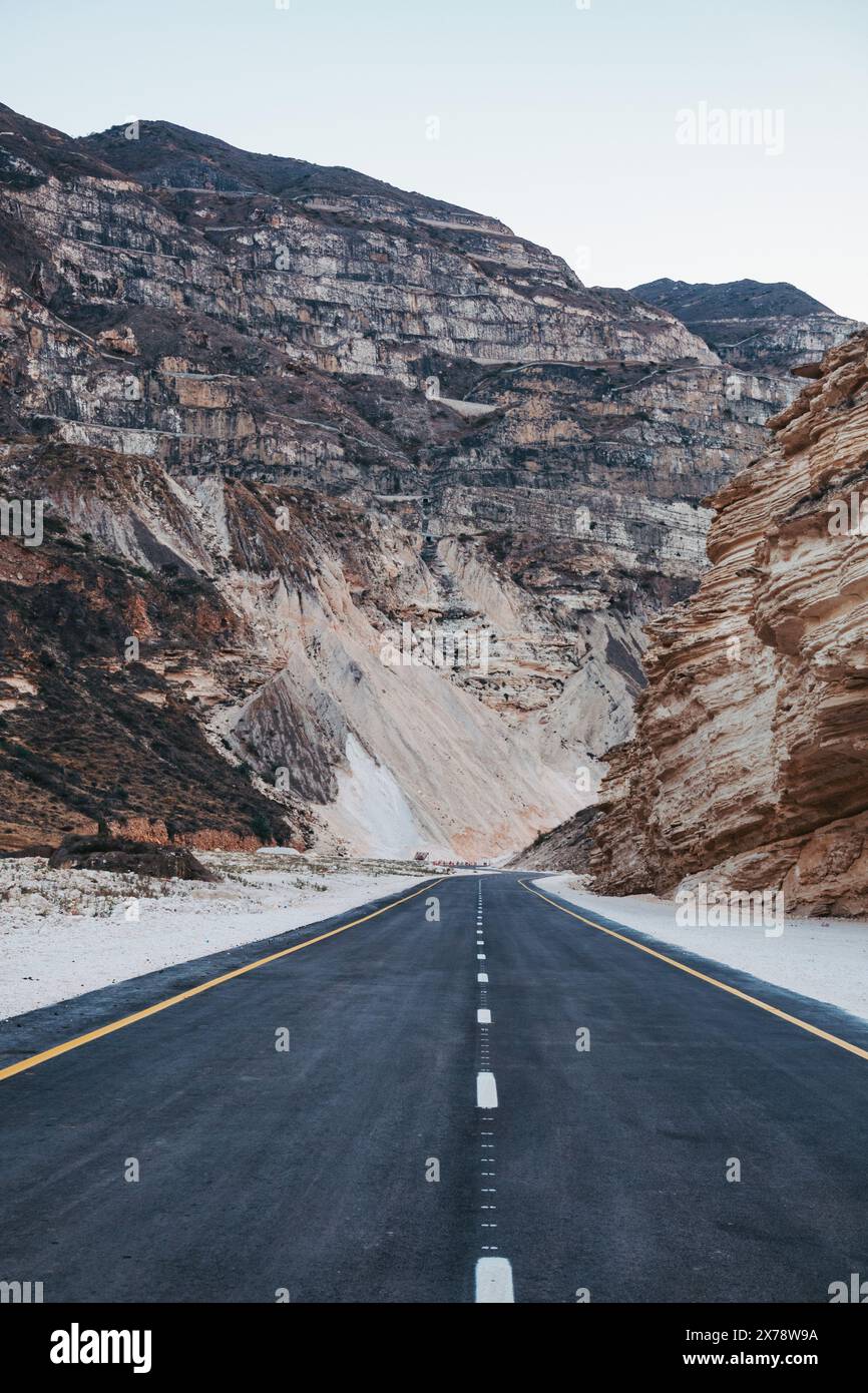 Empty Mountain Road Winding Through a Canyon at Sunset in rural Salalah ...