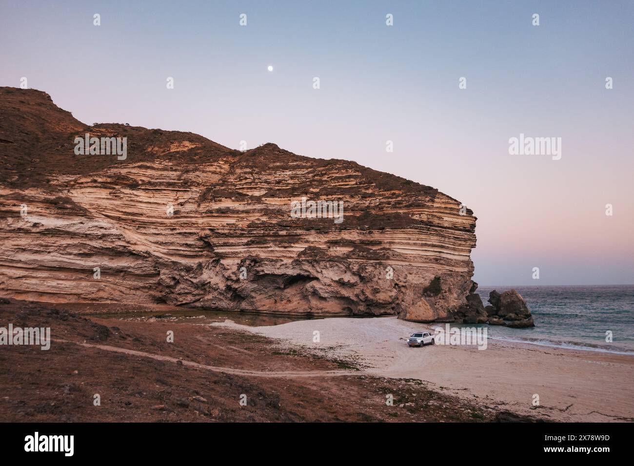 a large pickup truck on the remote "hidden" Afoul Beach in southern ...