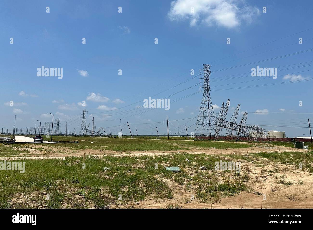 Power transmission lines were twisted and toppled after powerful storms ...