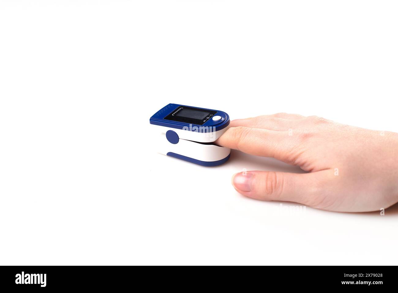 Close up of Finger and hand in an Oximeter Device. Pulse oximeter on ...
