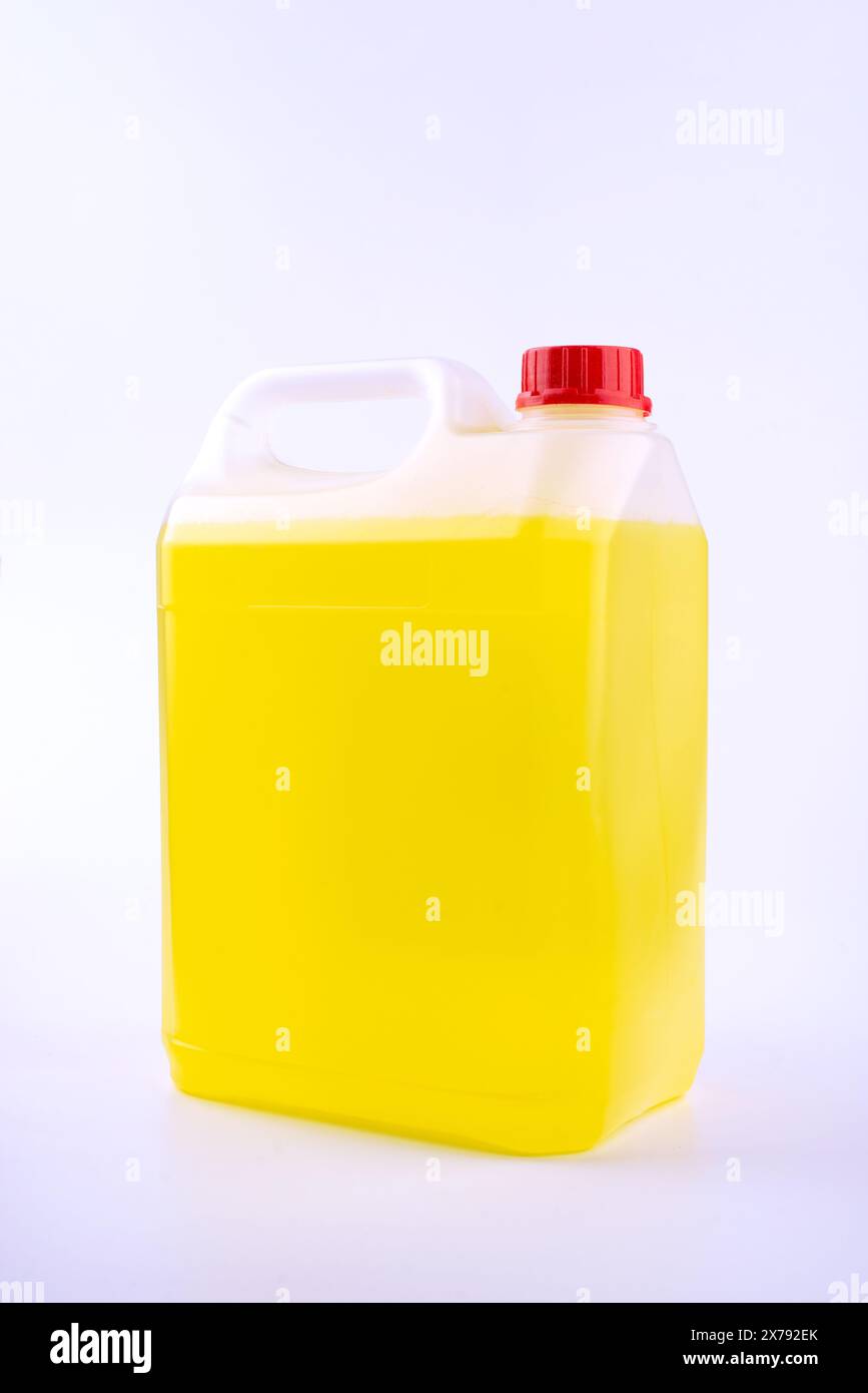 Plastic canister with pen and red cap, yellow liquid, mock up object ...