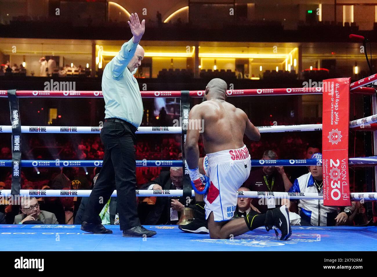 Frank Sanchez reacts after being knocked down by Agit Kabayel in their ...