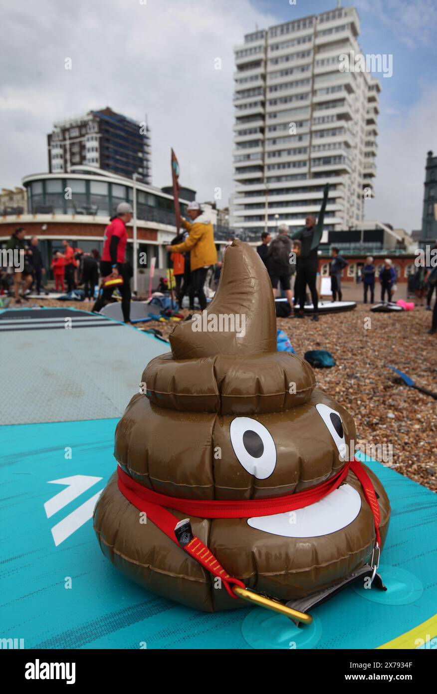 Brighton, England, UK. 18th May, 2024. An inflatable poo is attached to ...