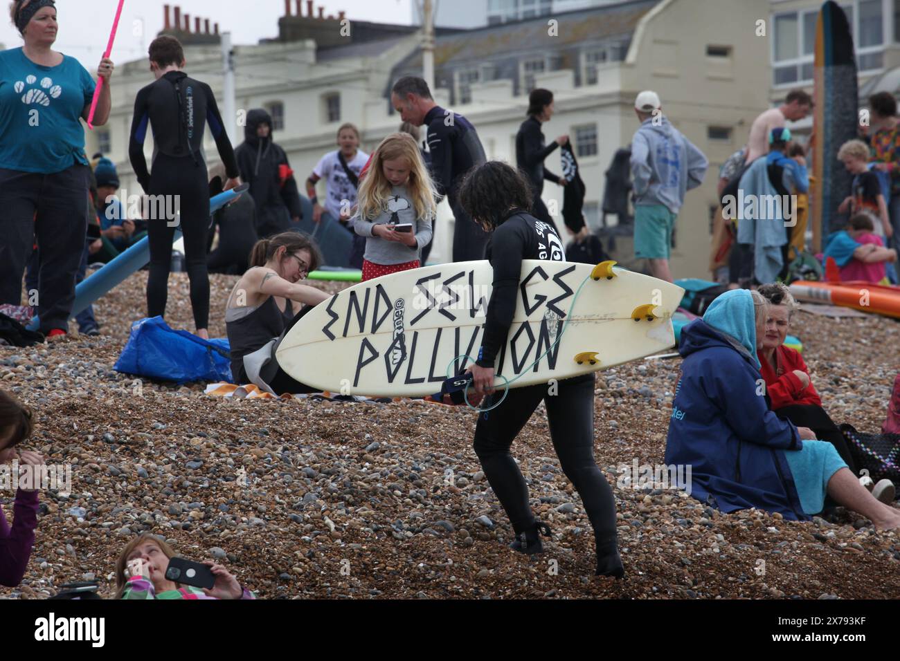 Brighton, England, UK. 18th May, 2024. A protester returns to the beach ...
