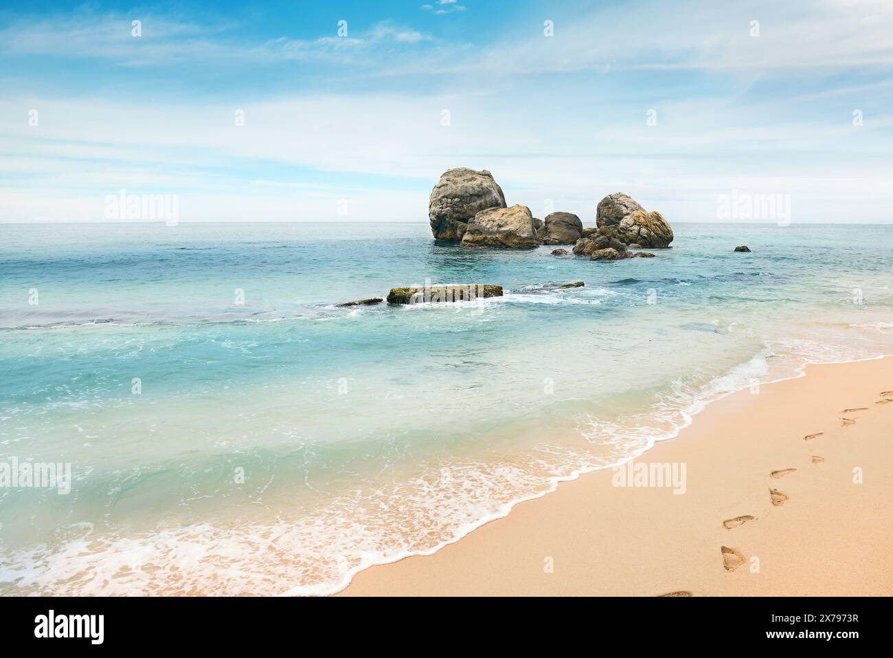 large rock in the ocean Stock Photo - Alamy