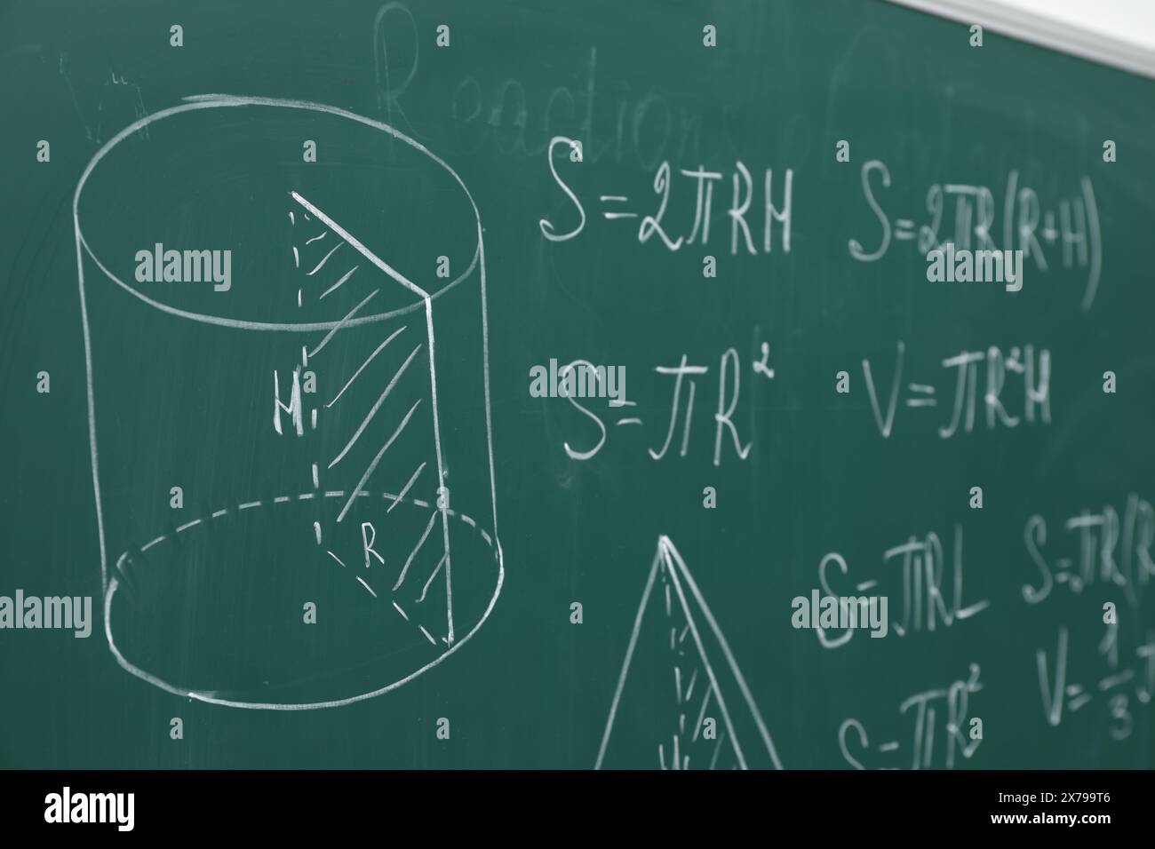 Different math formulas written with chalk on green board Stock Photo ...
