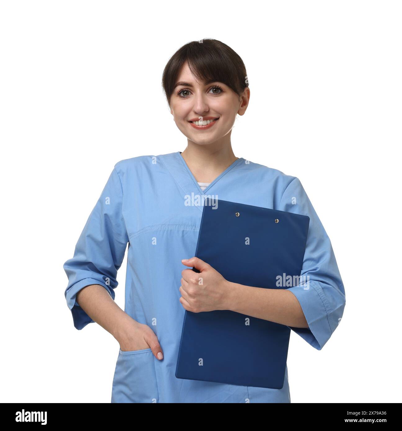 Portrait of smiling medical assistant with clipboard on white ...