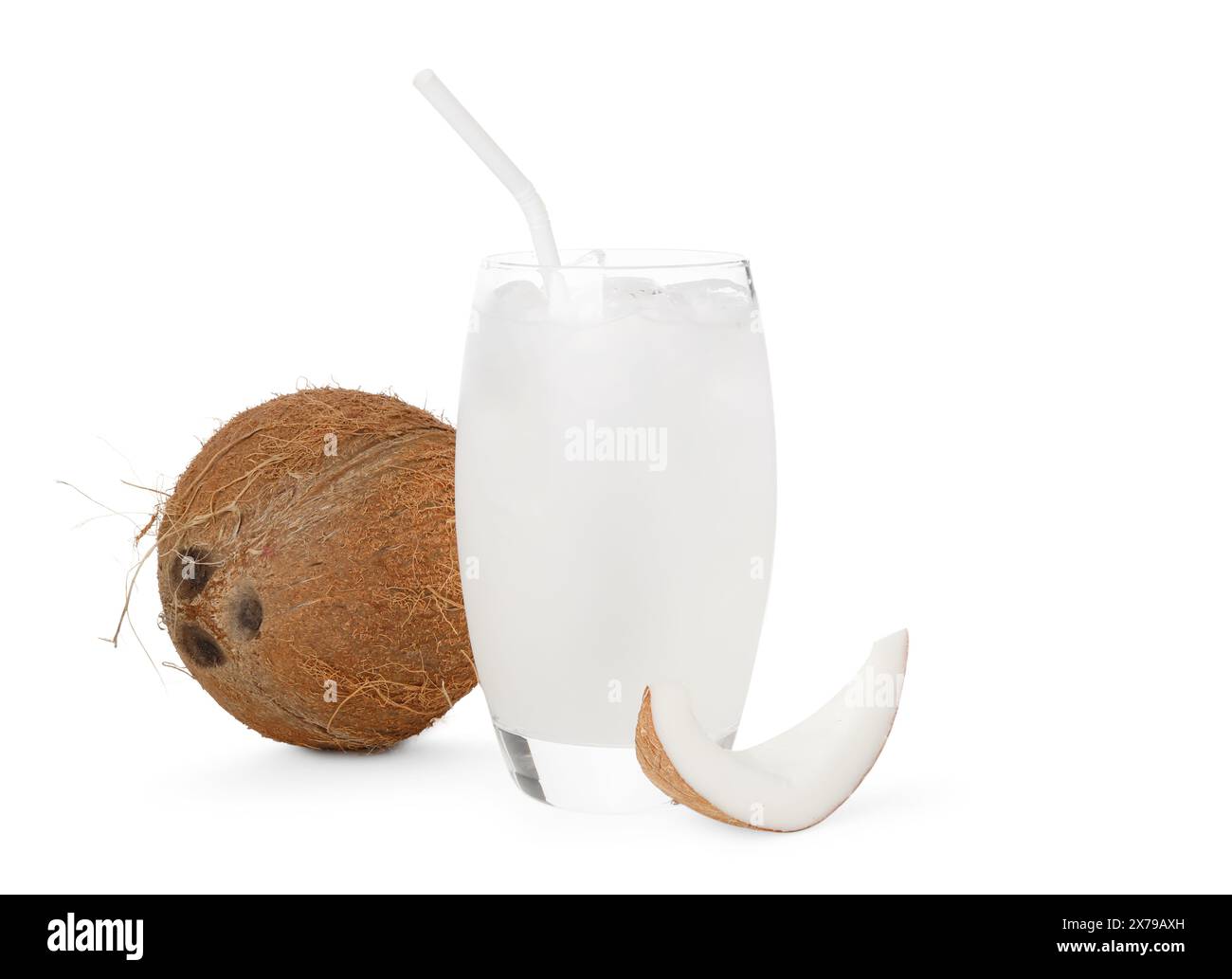 Glass of coconut water, ice cubes and nuts isolated on white Stock ...