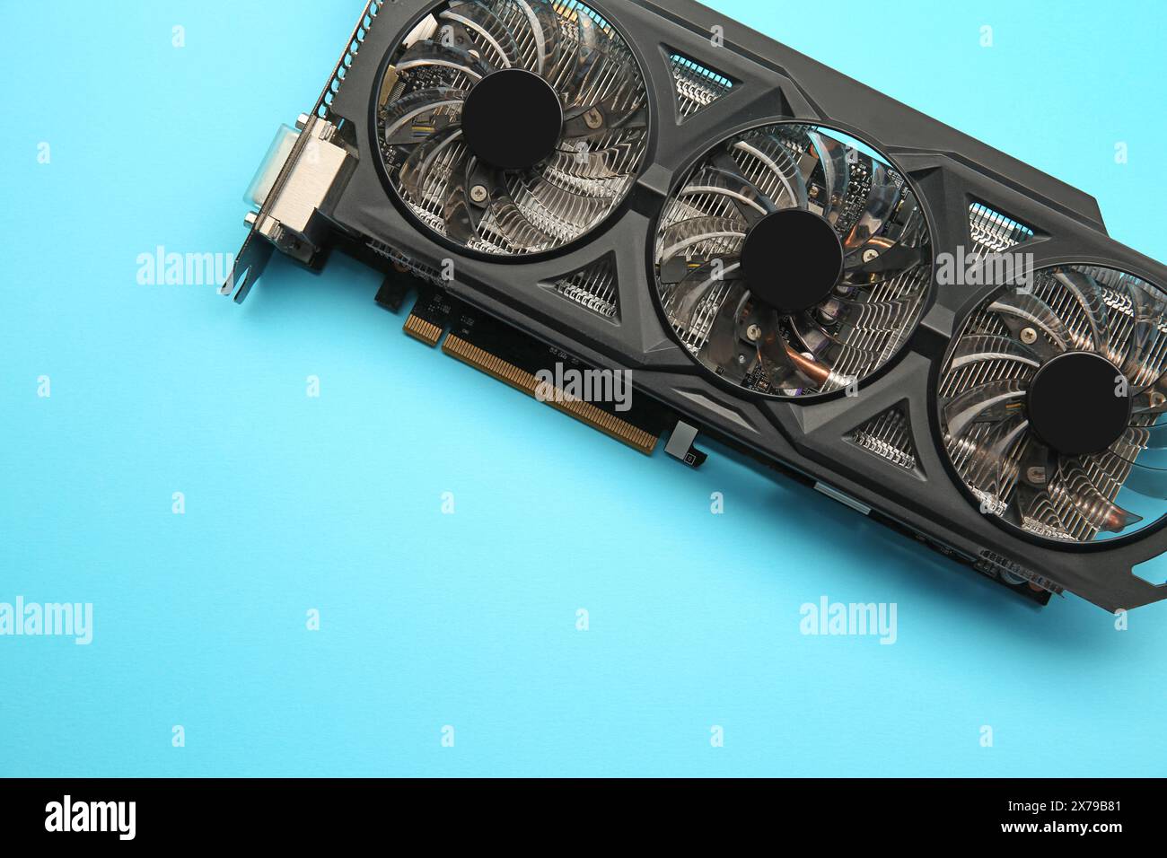 One graphics card on light blue background, top view. Space for text ...