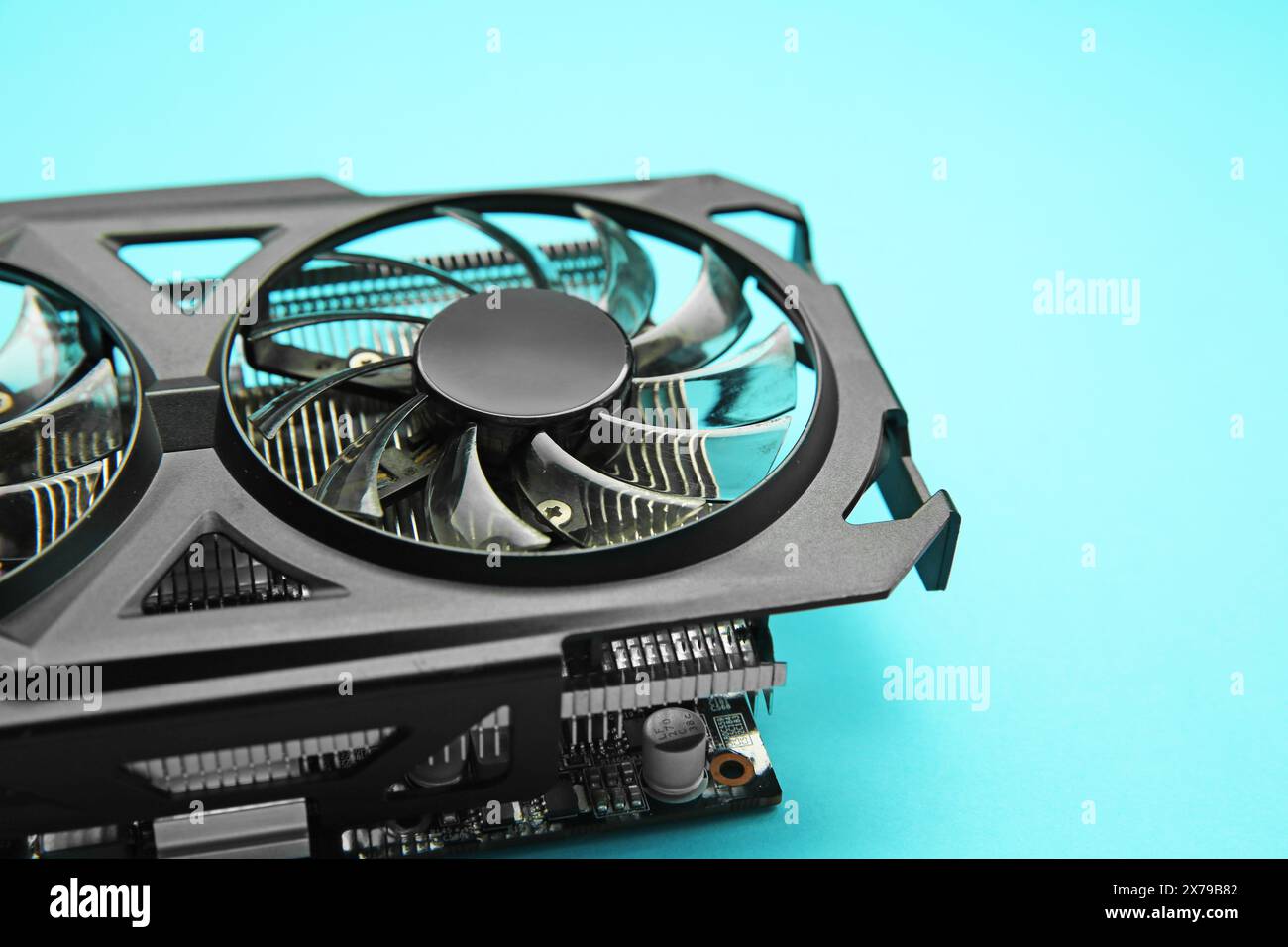 One graphics card on light blue background, closeup Stock Photo - Alamy