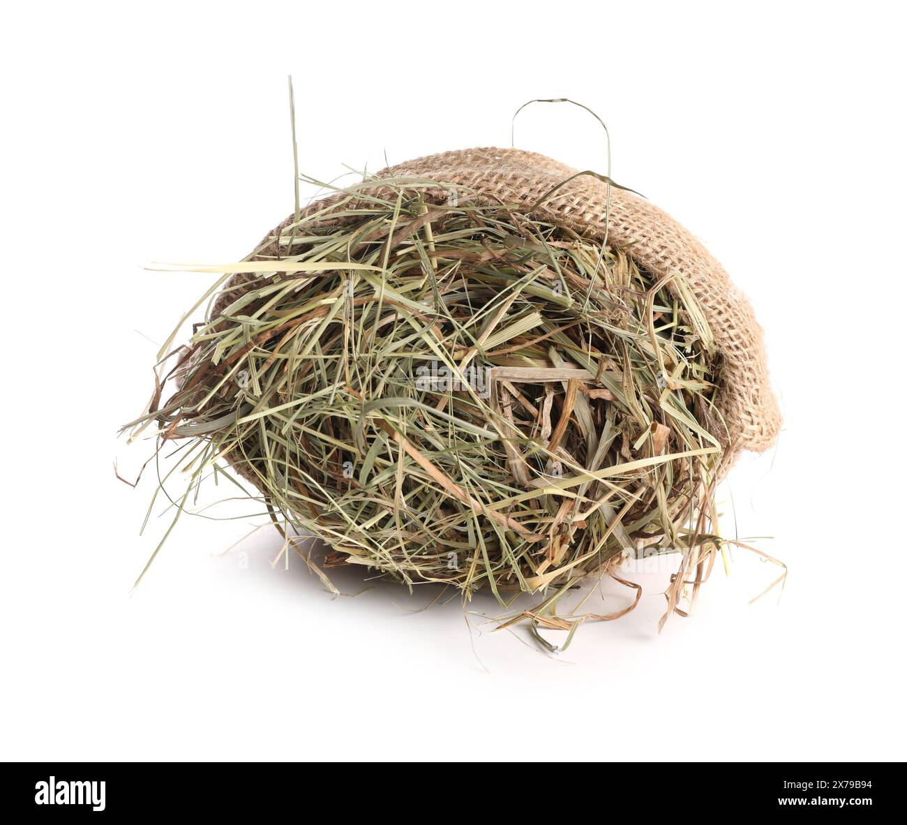 Dried hay in burlap sack isolated on white Stock Photo - Alamy