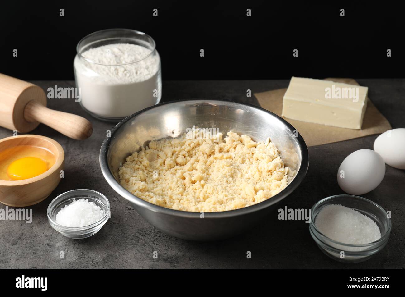 Making shortcrust pastry. Different ingredients for dough and rolling ...