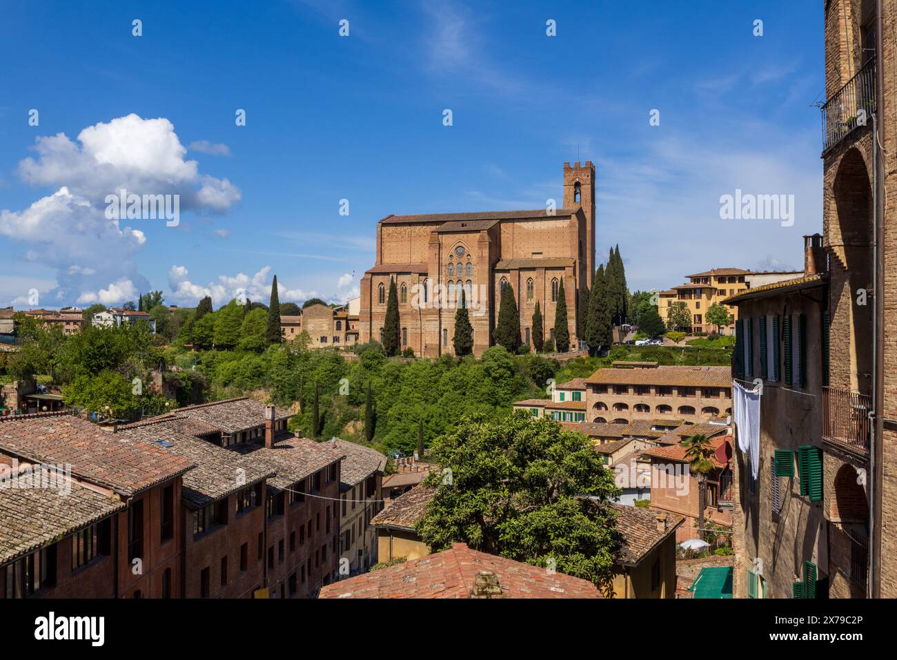 A distance view of the Basilica San Domenico church in Siena in Tuscany ...