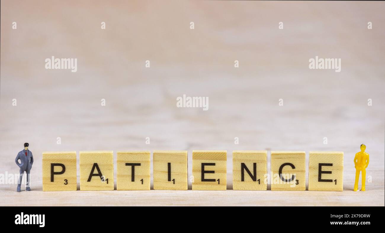 PATIENCE word written letters two men figures aside Good things come to ...
