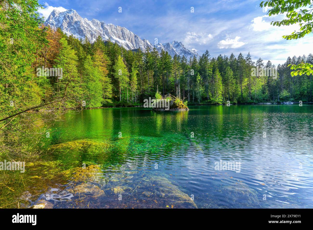 Lake Badersee in spring with Zugspitze group 2962m in the Wetterstein ...