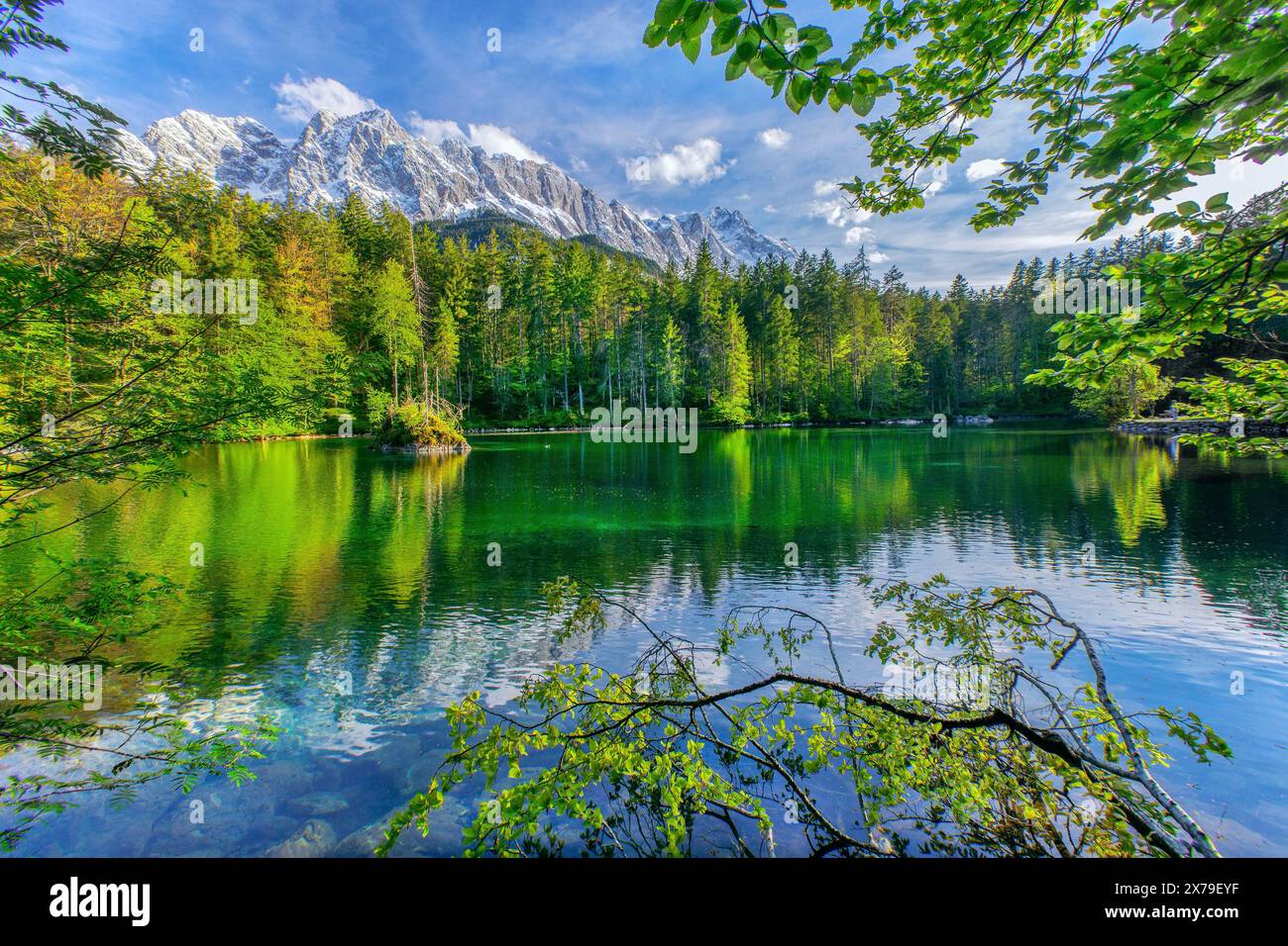 Lake Badersee in spring with Zugspitze group 2962m in the Wetterstein ...