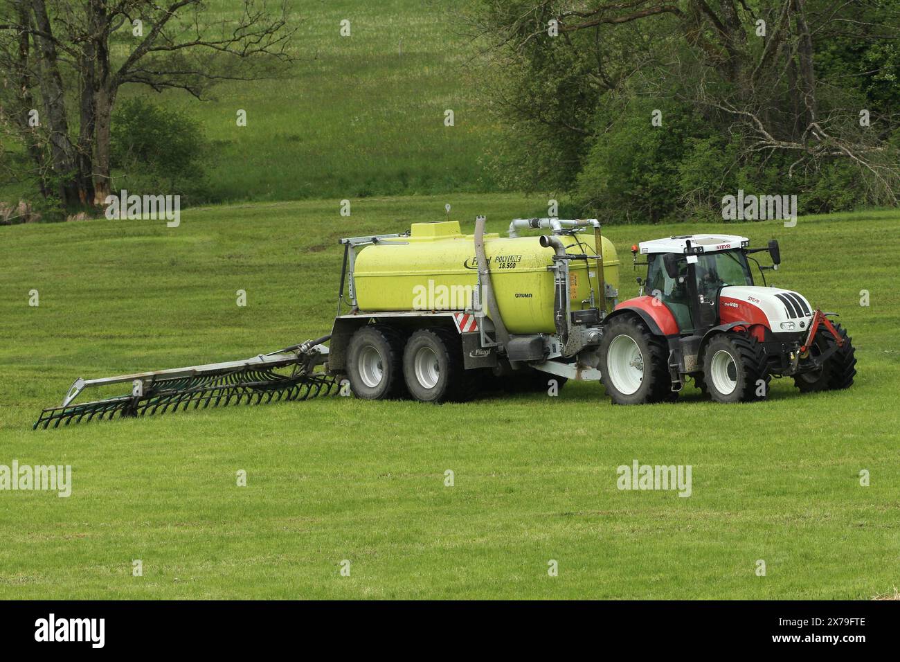 Farmer spreading liquid manure, Allgaeu, Bavaria, Germany Stock Photo - Alamy