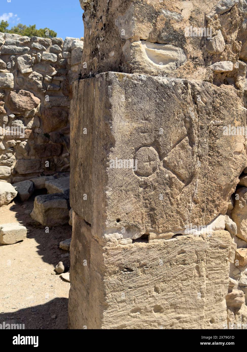 Sign carved in stone former wall symbol graffiti In archaeological site ...