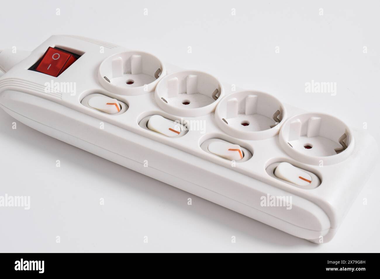 White Electrical plug in outlet socket at home isolated on white ...