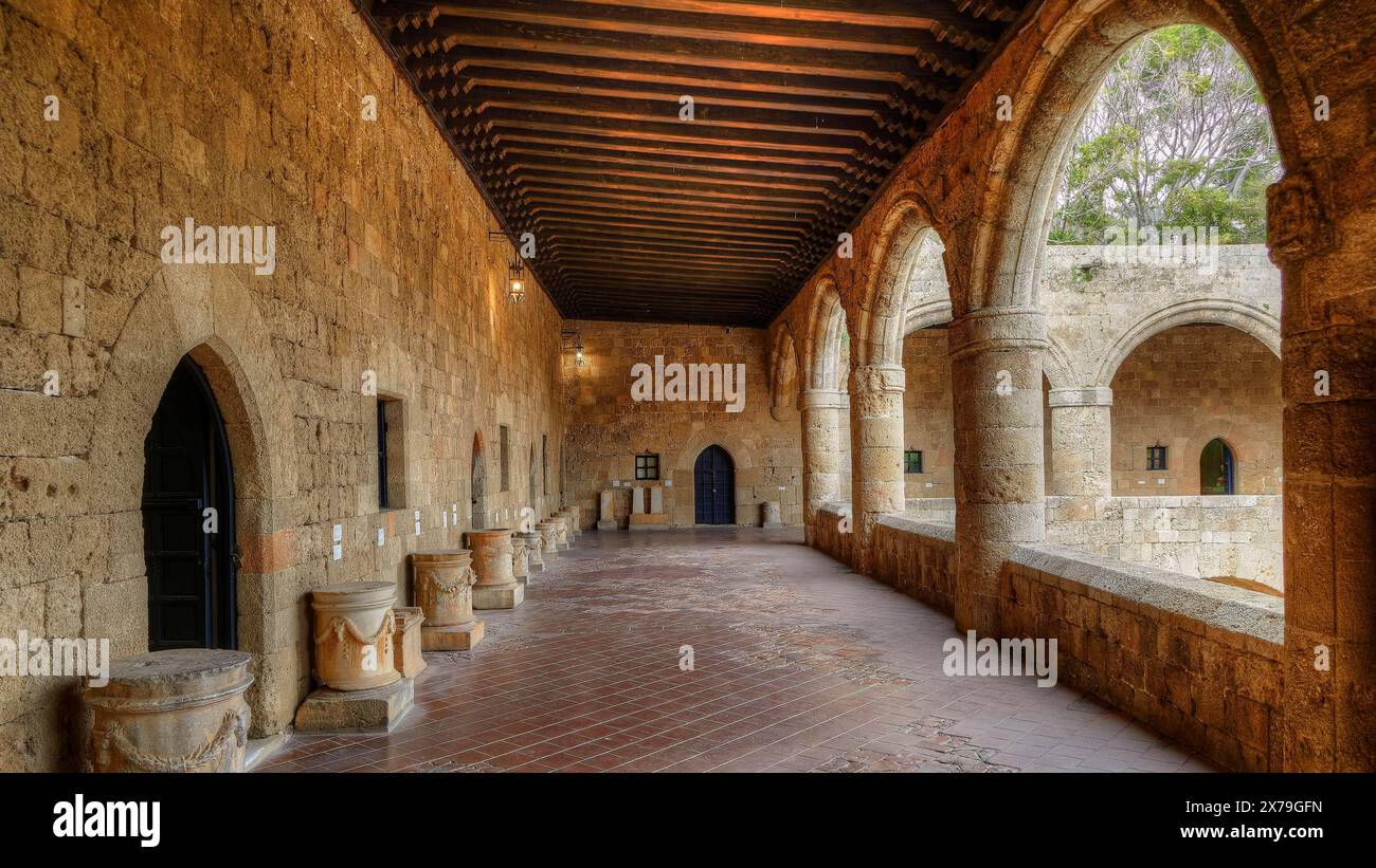 HDR shot, Long corridor in a historic building with Gothic arcades ...