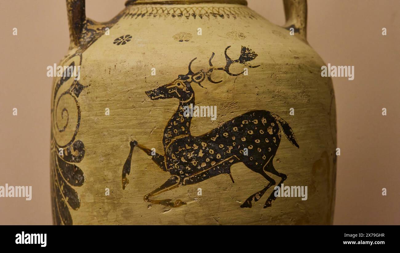 Antique jug with a detailed image of a stag and floral ornaments in ...
