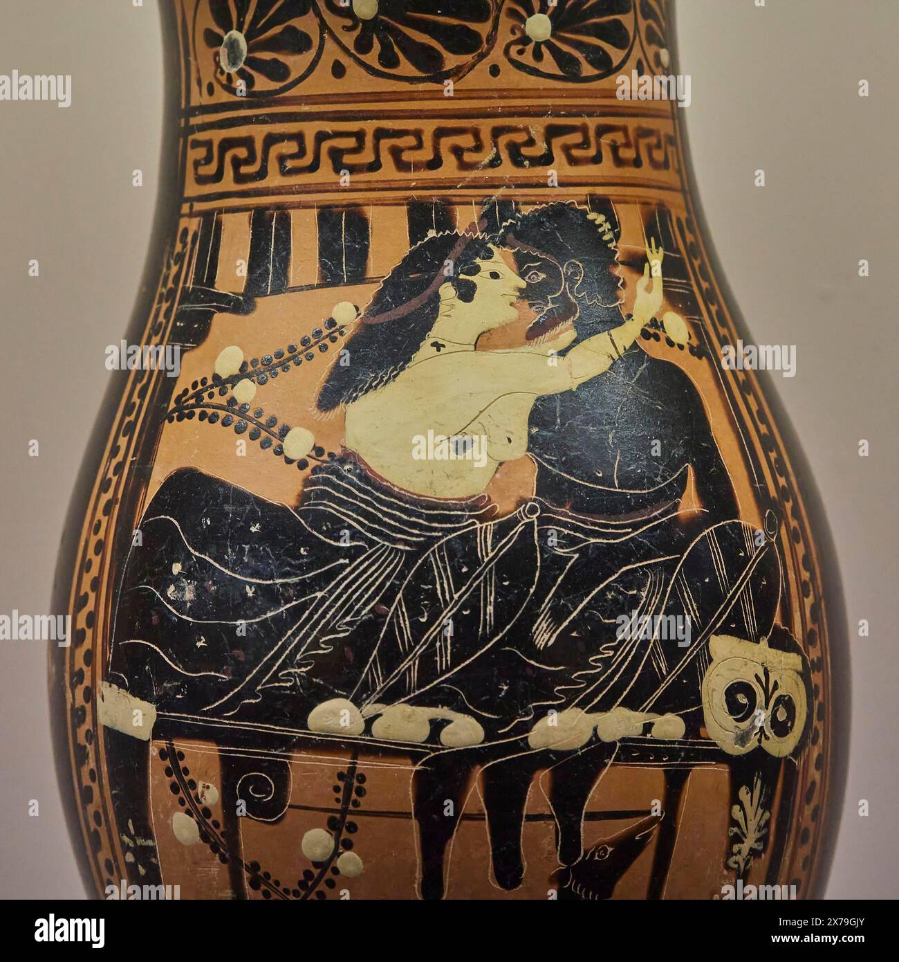 Antique Greek vase with picture of lovers in an intimate embrace, dog ...